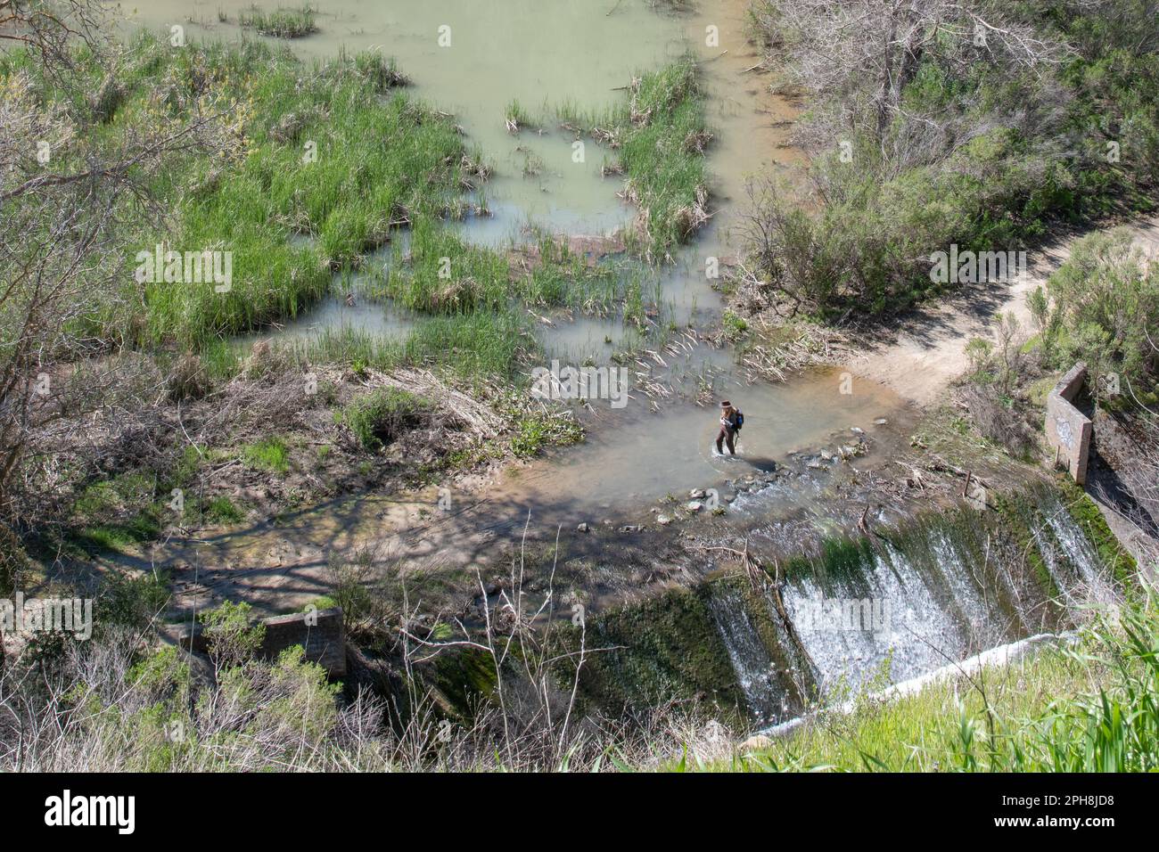 Walking through flood water hi-res stock photography and images - Alamy