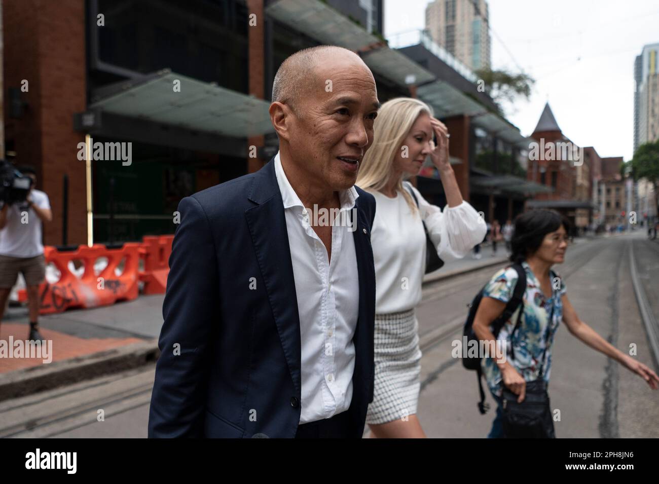Neurosurgeon Charlie Teo (left) and his fiancee Traci Griffiths leave ...