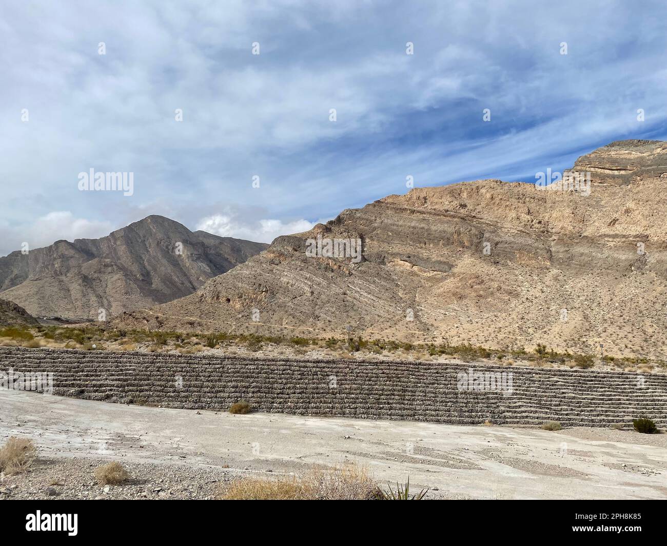 A majestic rock formation stretching out over an expansive landscape ...