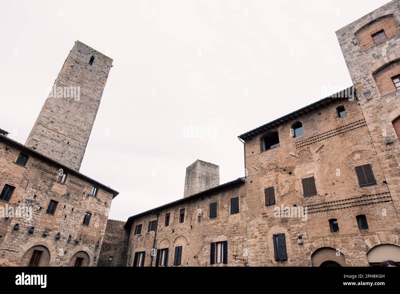 Charming Tuscany village with ancient stone buildings and winding ...