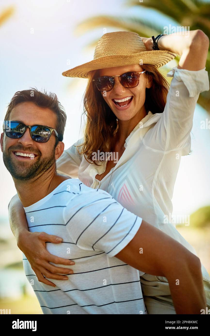 When the sun comes out to play so do they. a happy young couple ...
