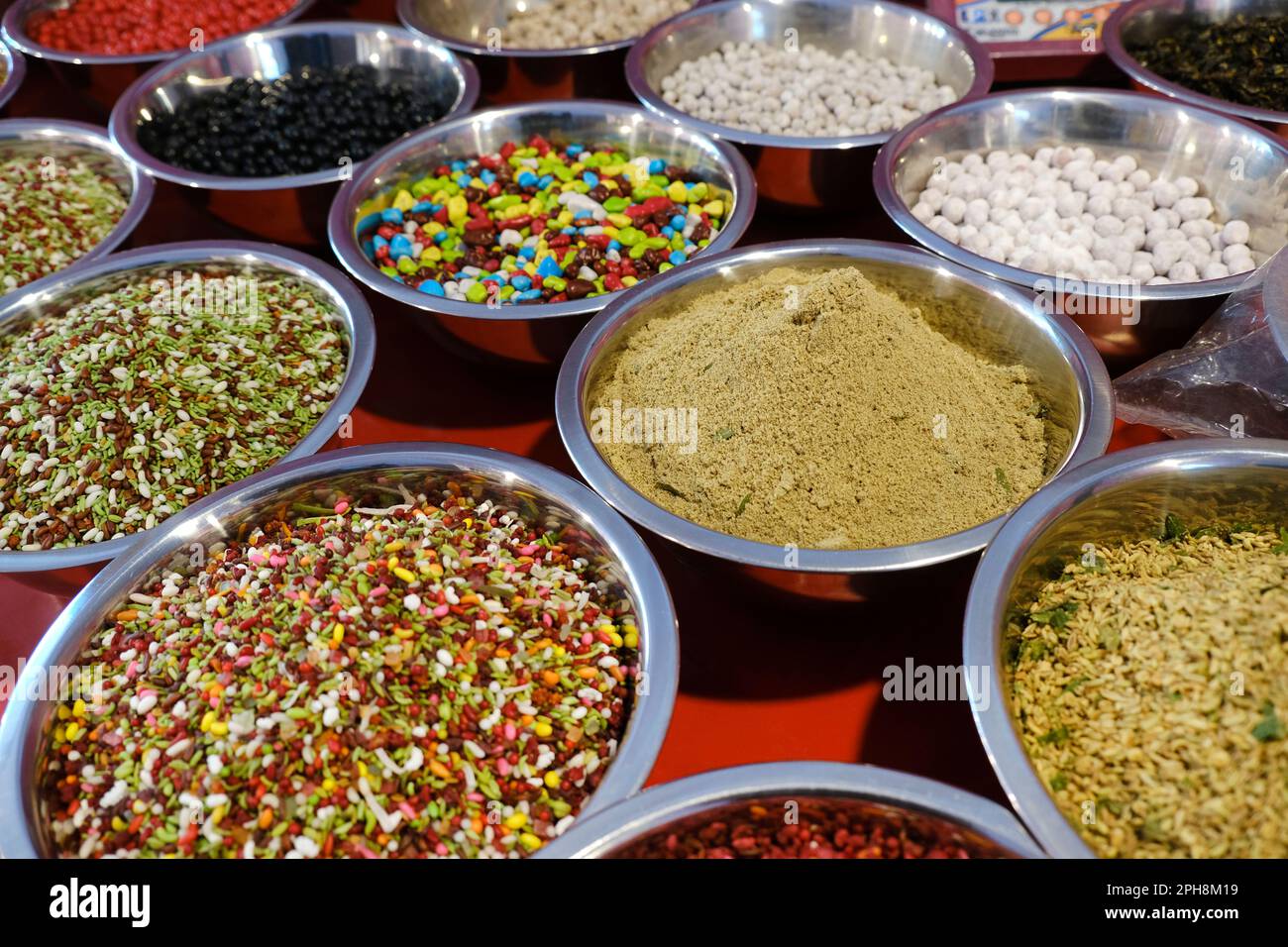 Indian variety of traditional mukhwas (mouth freshener) in bowl for ...