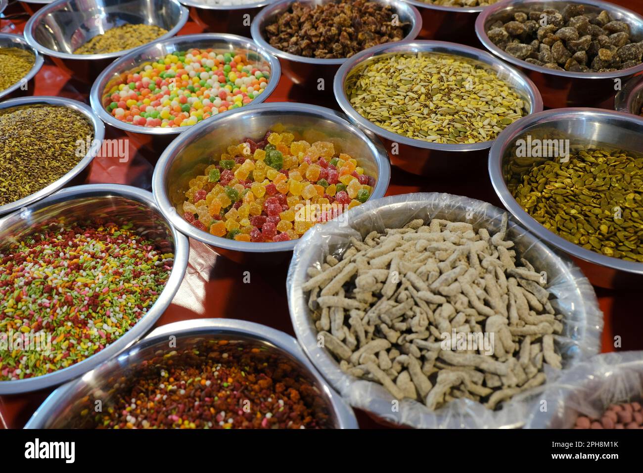 Indian variety of traditional mukhwas (mouth freshener) in bowl for ...