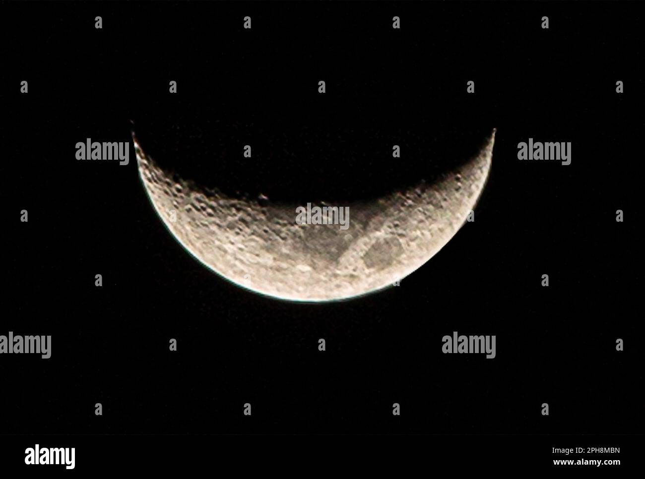 Gaza, Palestine. 26th Mar, 2023. The appearance of the crescent moon in ...