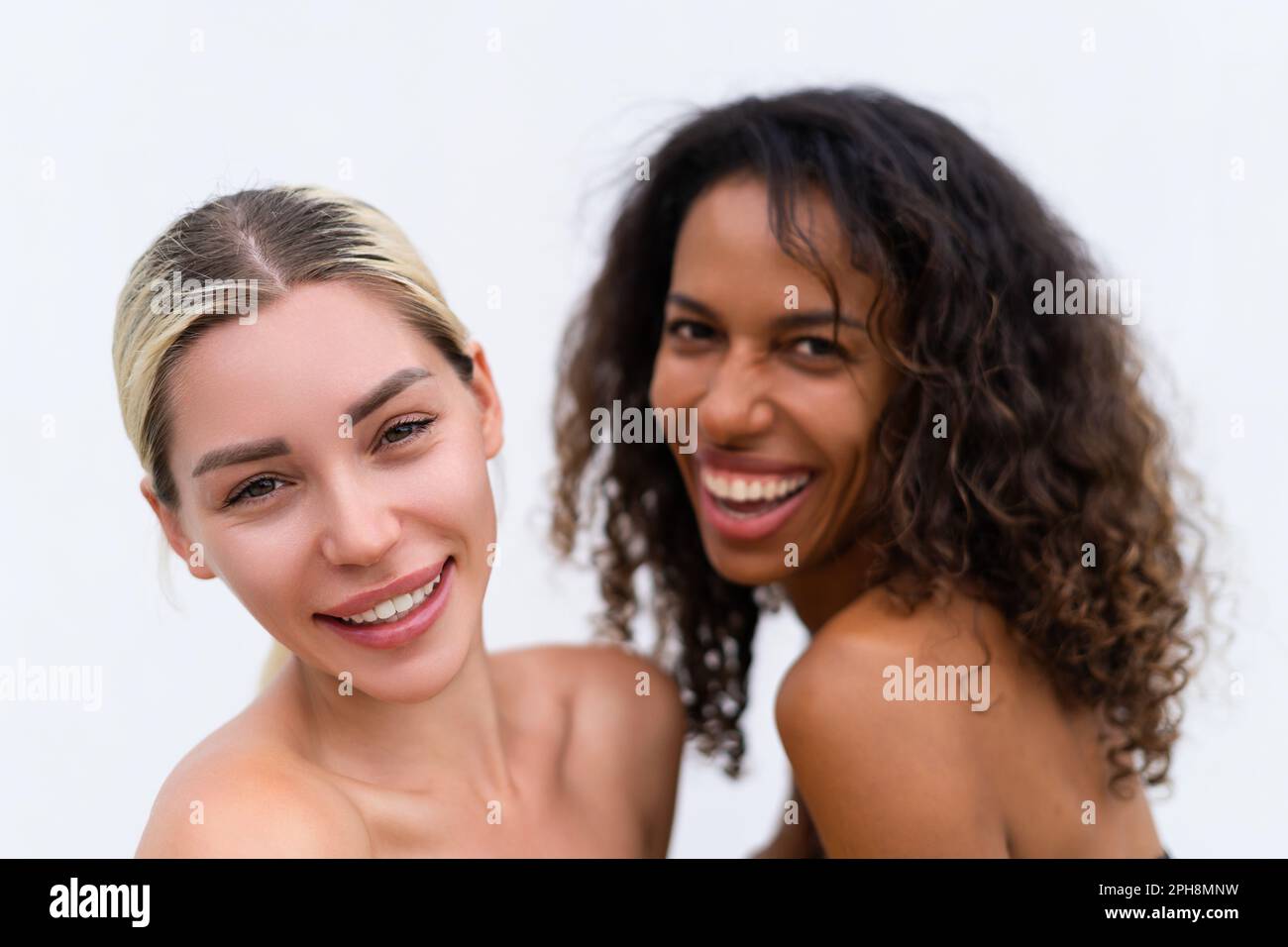 Woman Close Beauty Portrait Mixed Race Black Skin And White Skin Two Female On White Background