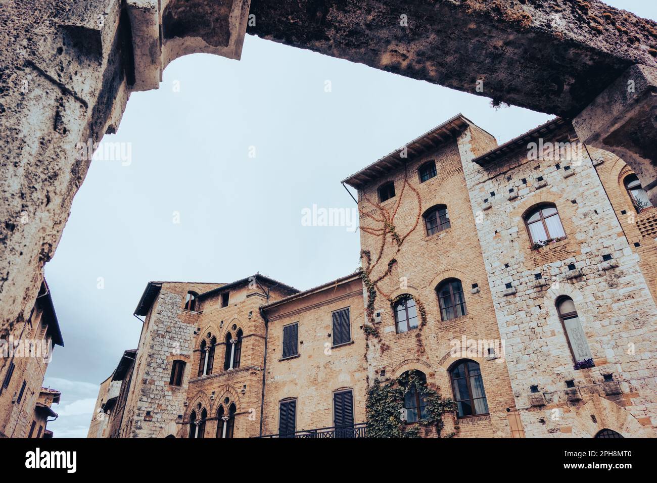 Medieval Tuscany village surrounded by rolling hills Stock Photo - Alamy