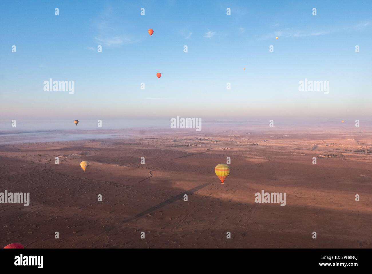 Magical hot air balloons ride above the Morocco desert Stock Photo - Alamy