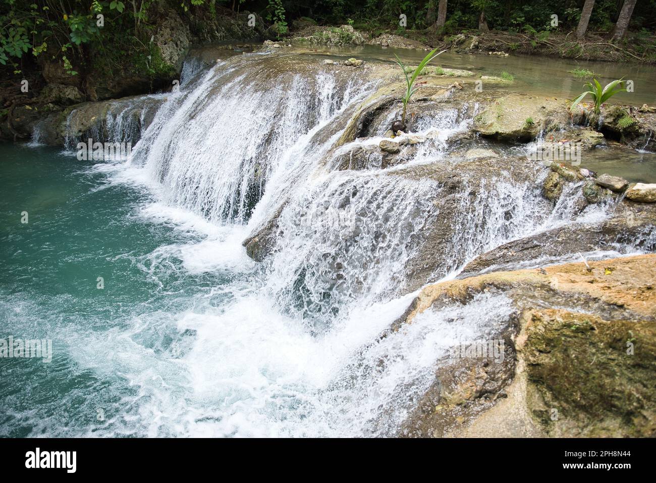 The idyllic Cambugahay Waterfalls in Siquijor in the Philippines that ...