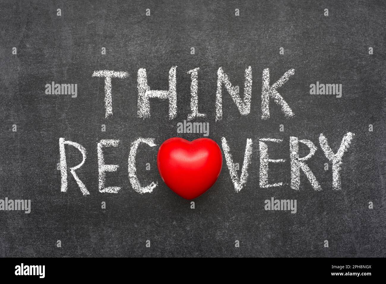 think recovery phrase handwritten on blackboard with heart symbol ...