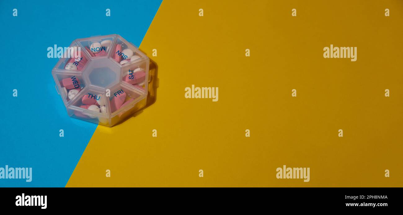 Organizer weekly shots medical pill box with doses of tablets for daily ...