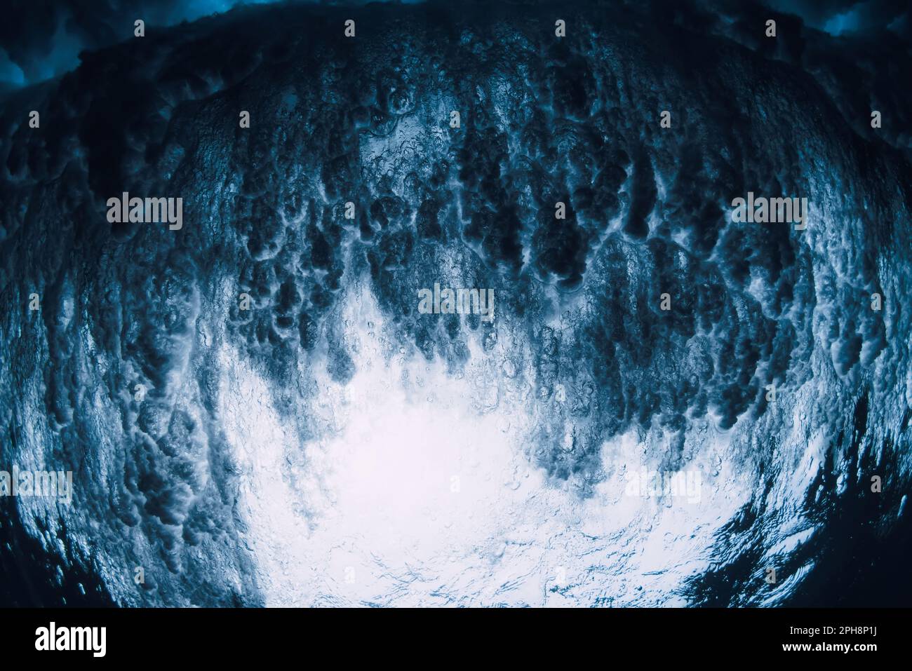 Wave textures with vortex underwater in transparent sea water. Swell in ...