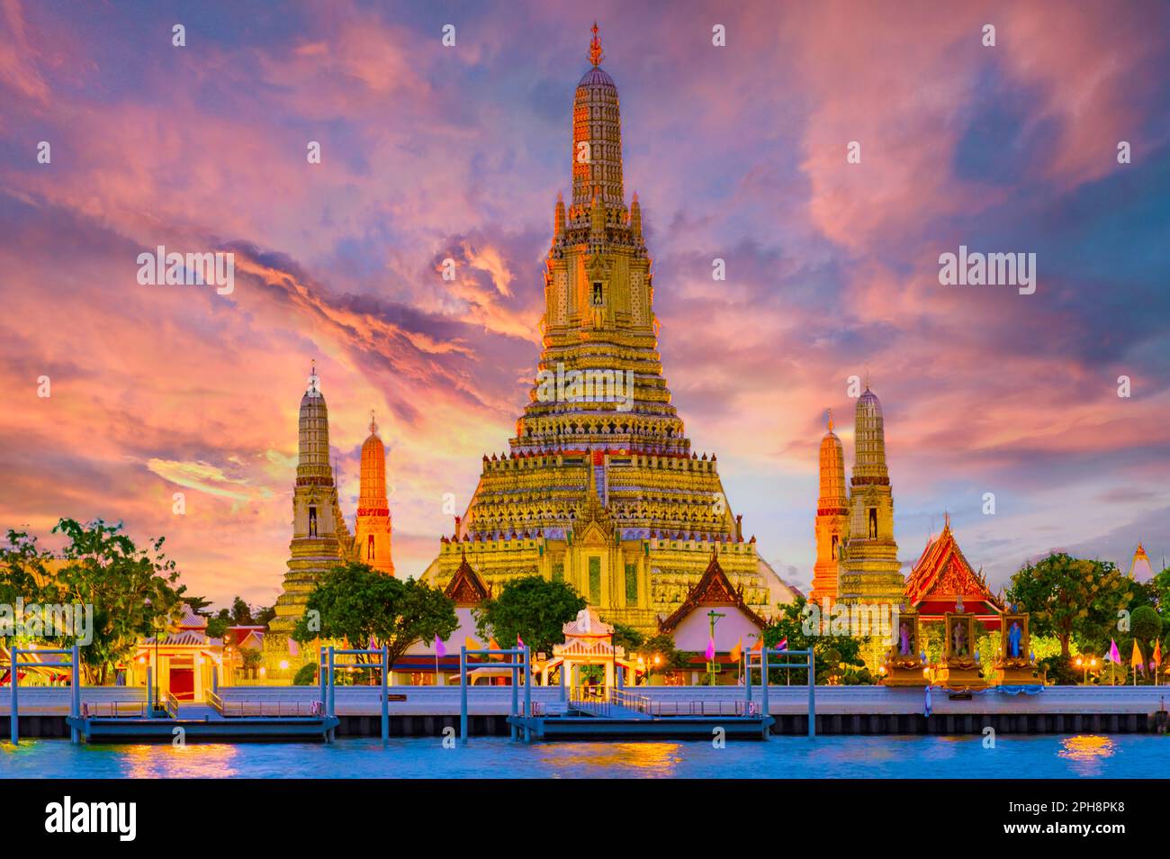 Wat Arun temple Bangkok during sunset in Thailand. Chao praya river ...