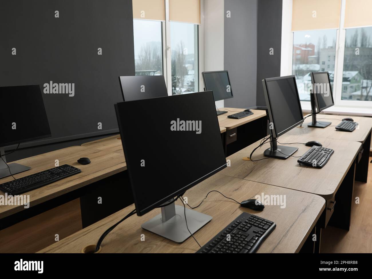 Rows of computers in empty office hi-res stock photography and images ...