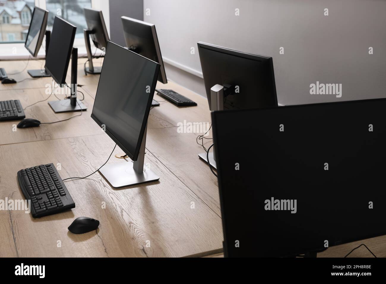 Many modern computers in open space office Stock Photo - Alamy