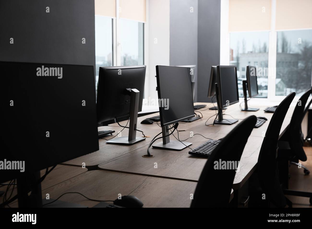 Many modern computers in open space office Stock Photo - Alamy
