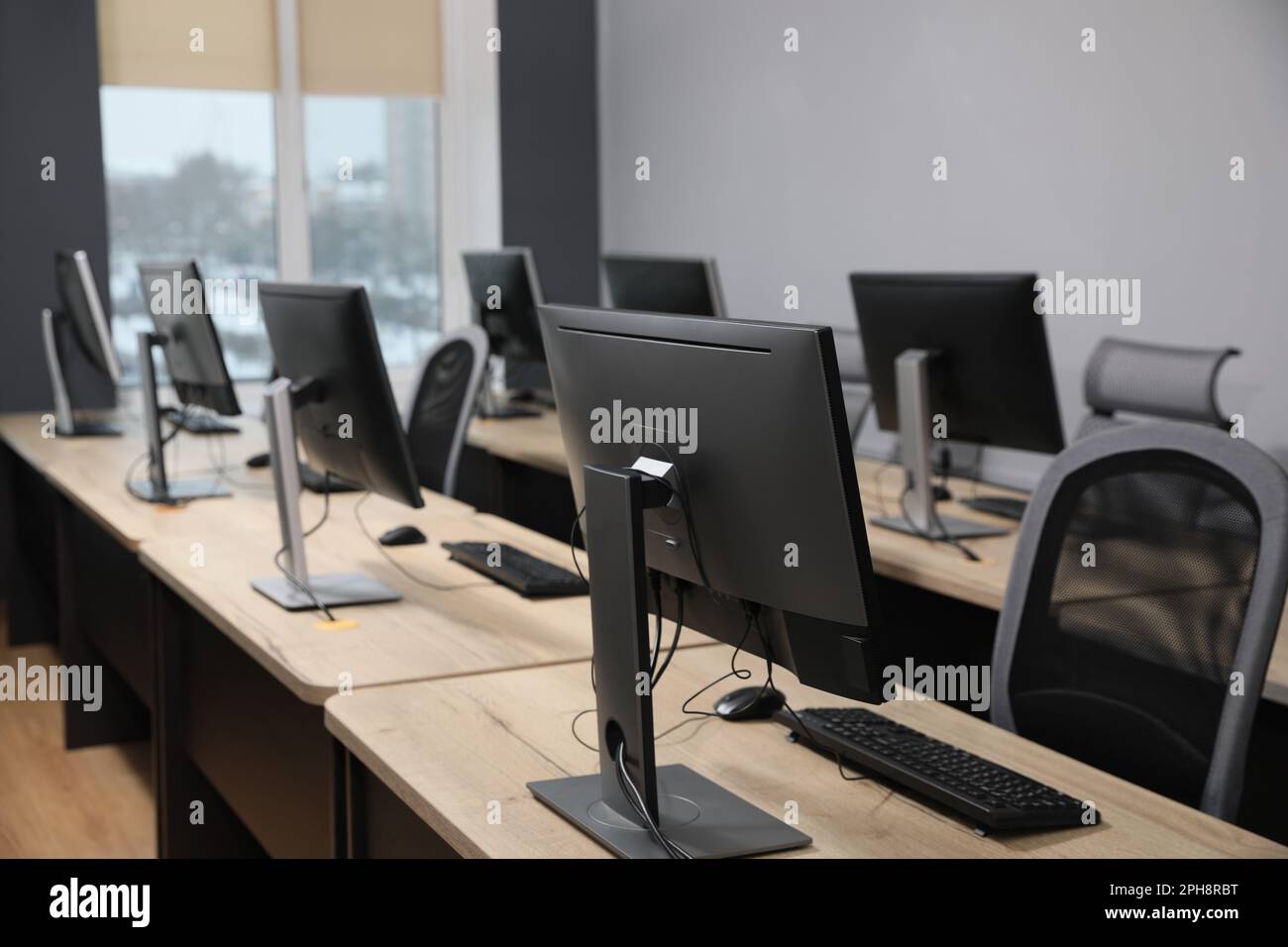 Rows of computers in empty office hi-res stock photography and images ...