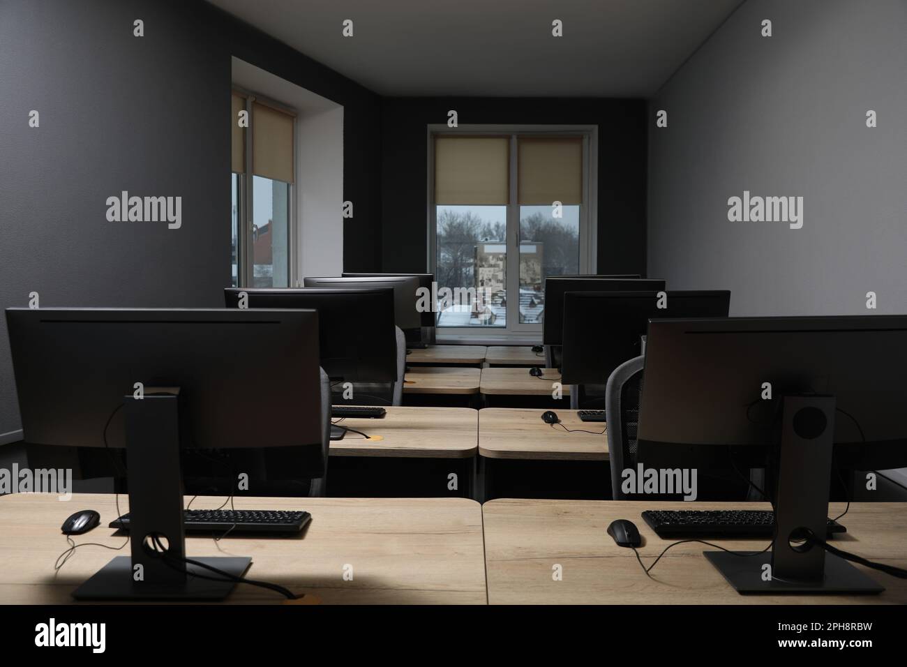 Many modern computers in open space office Stock Photo - Alamy