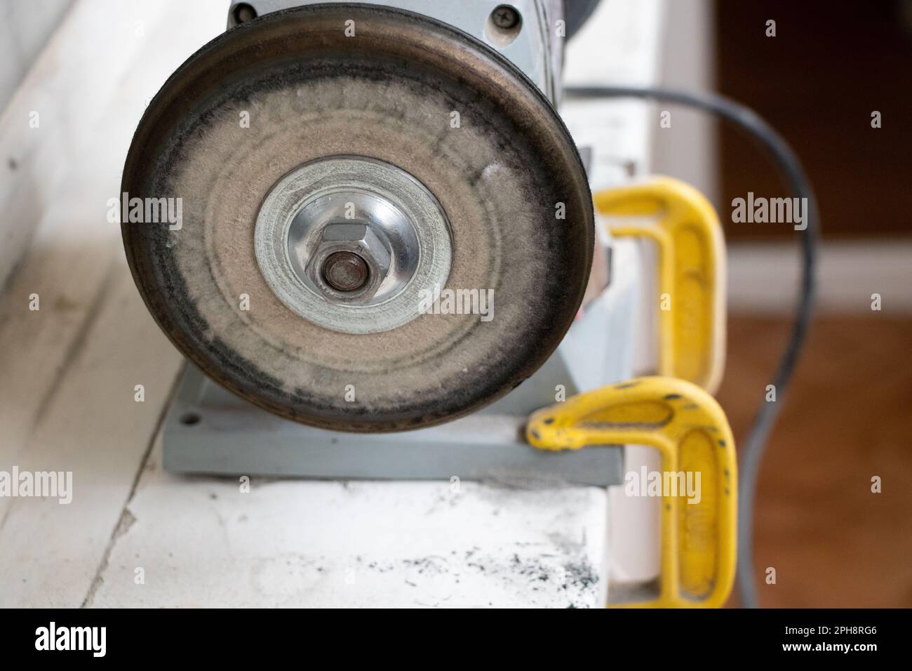 grinding machine on shelves at home close up, home workshop Stock Photo ...