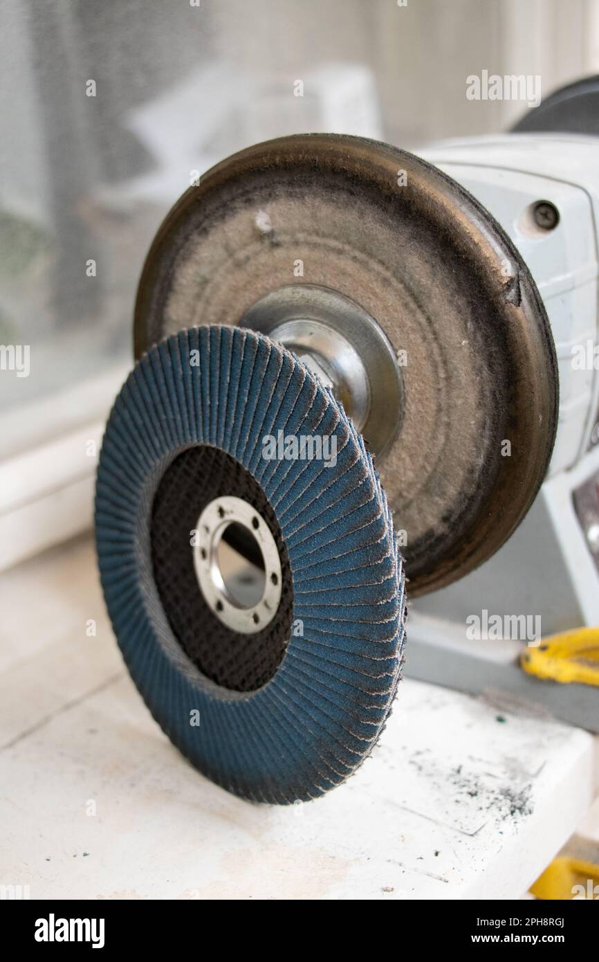 grinding machine on shelves at home close up, home workshop Stock Photo ...