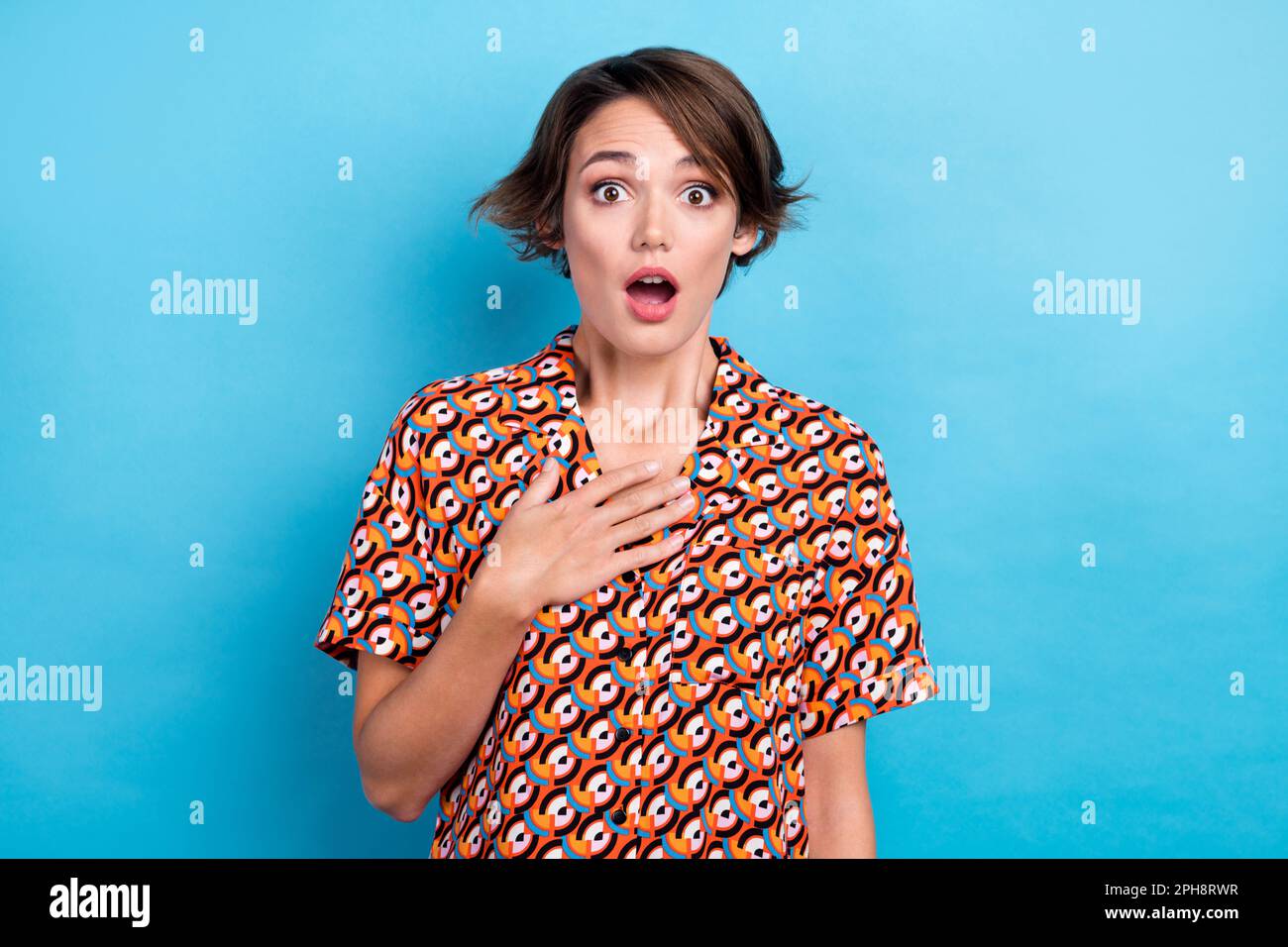 Photo of impressed speechless lady hand touch chest open mouth staring ...