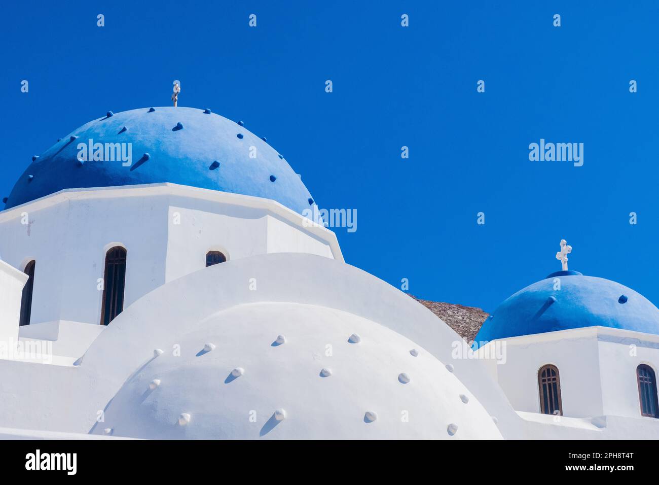 The famous blue domes of the buildings of Santorini island Stock Photo ...
