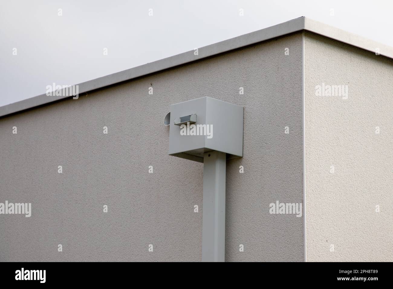 aluminum grey gutter on modern roof of facade building and gray ...