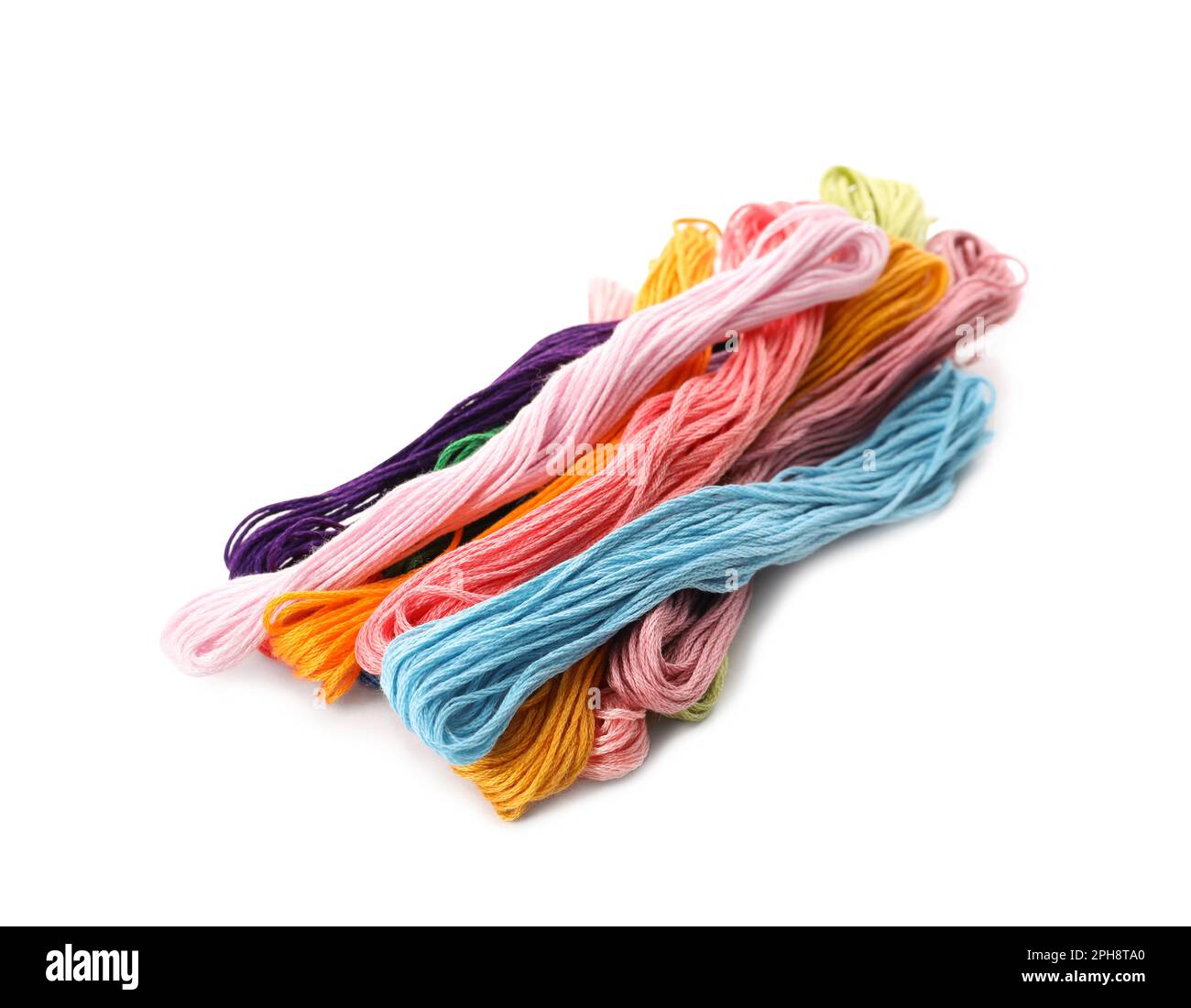 Colorful embroidery floss set on white background Stock Photo - Alamy
