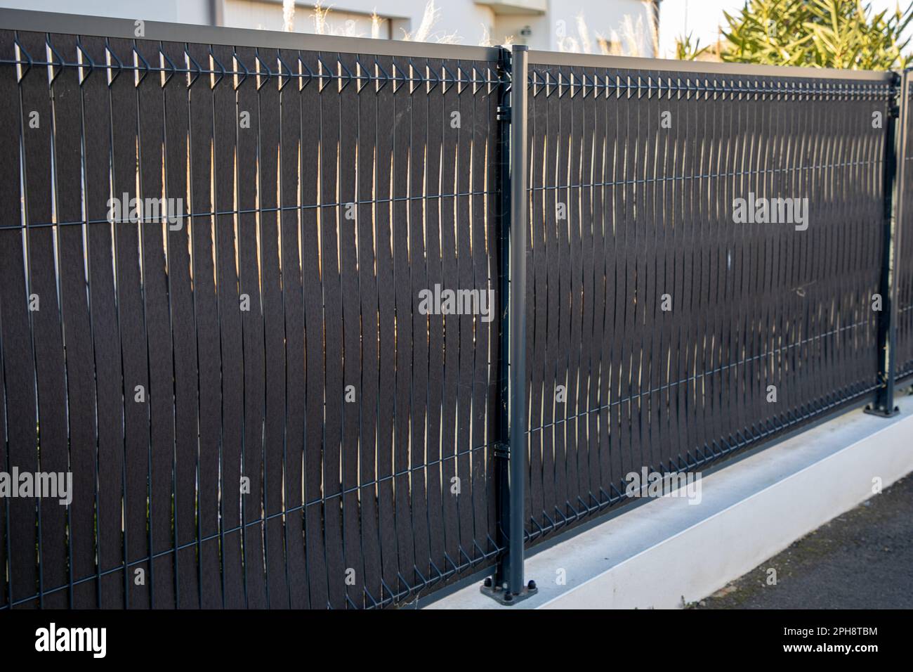 fence grey steel wooden dark modern barrier of suburb house facade ...