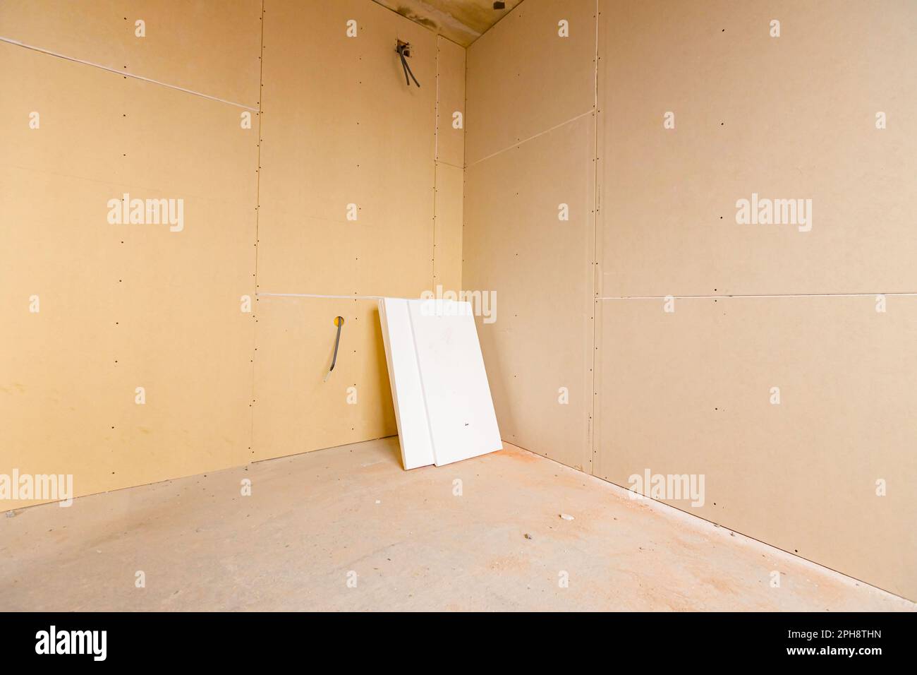 A few pieces of plaster boards are waiting to be installed on the ...