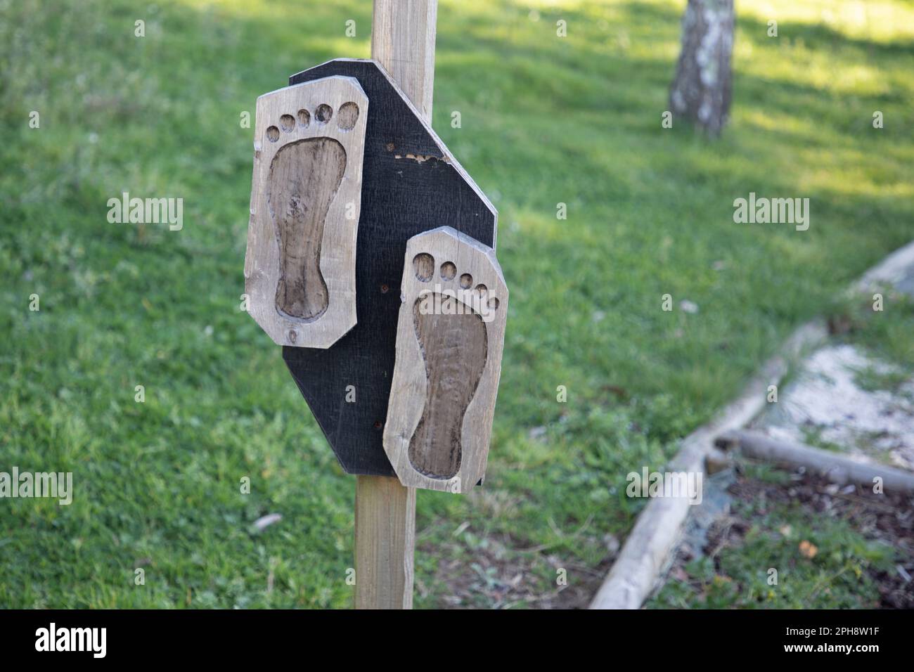 No shoes sign in park outdoor floor wooden panel walk barefoot Stock ...