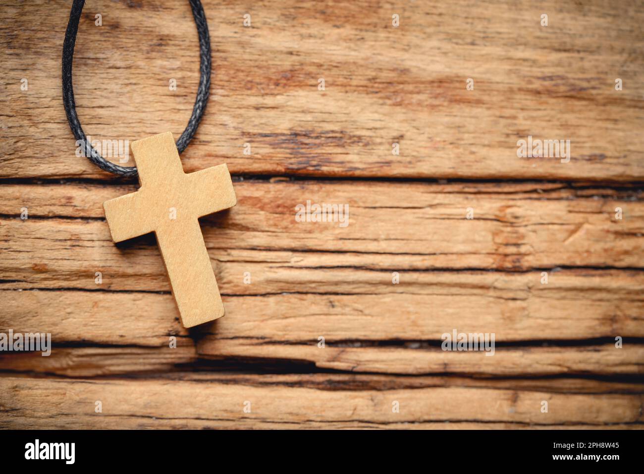 Wooden Christian cross on table, top view. Space for text Stock Photo ...