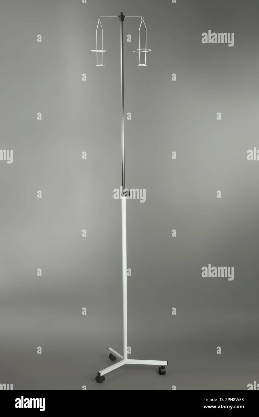 Drop counter stand on grey background. Medical equipment Stock Photo ...