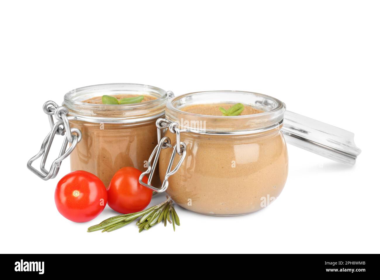 Glass jars with delicious liver pate on white background Stock Photo ...