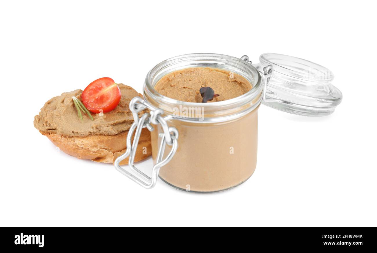 Fresh bread and glass jar with delicious liver pate on white background ...