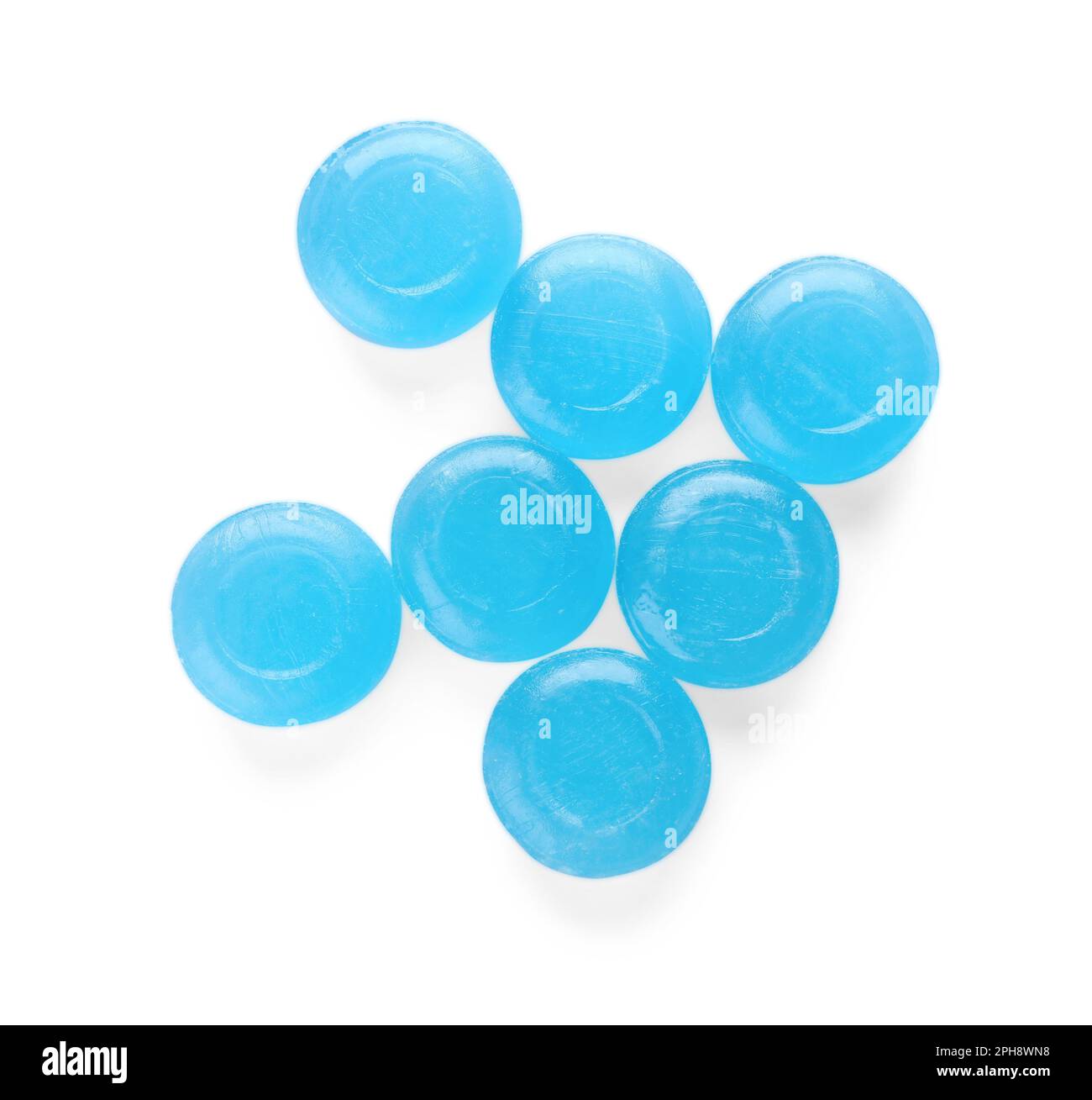 Many light blue cough drops on white background, top view Stock Photo ...