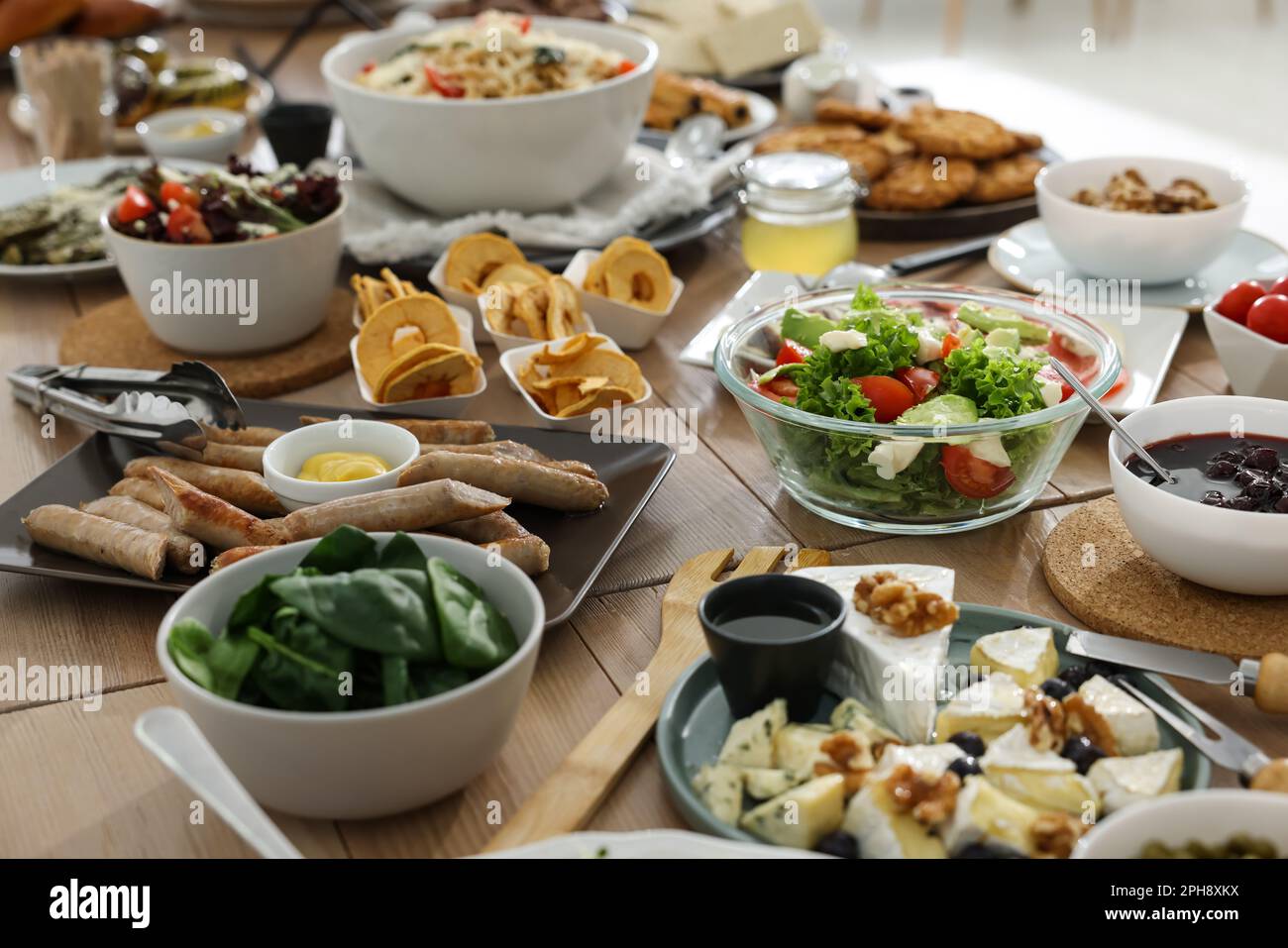 Brunch table setting with different delicious food indoors Stock Photo ...