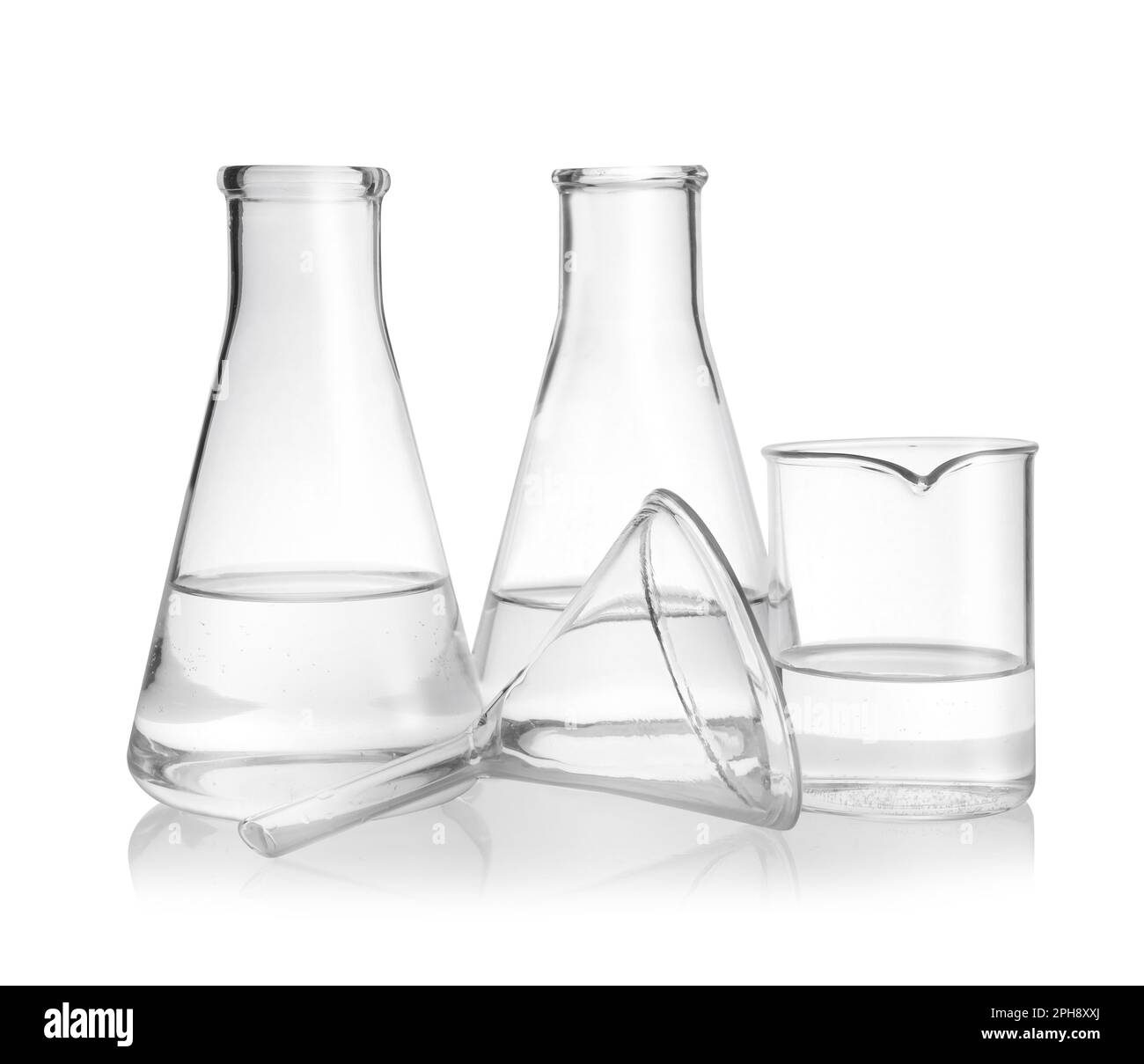 Laboratory glassware with transparent liquid on white background Stock ...