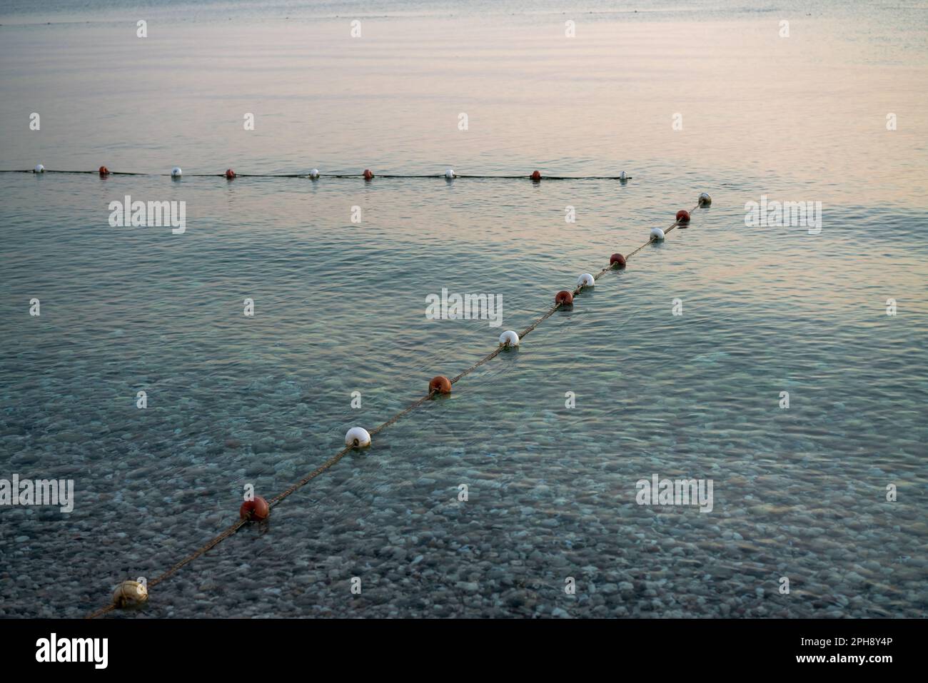 Calm on sea in early morning at sunrise, close-up, tourist concept of ...