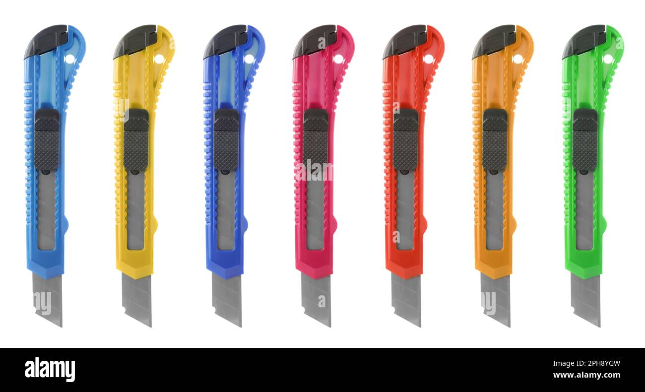 Set with different colorful utility knives on white background. Banner ...