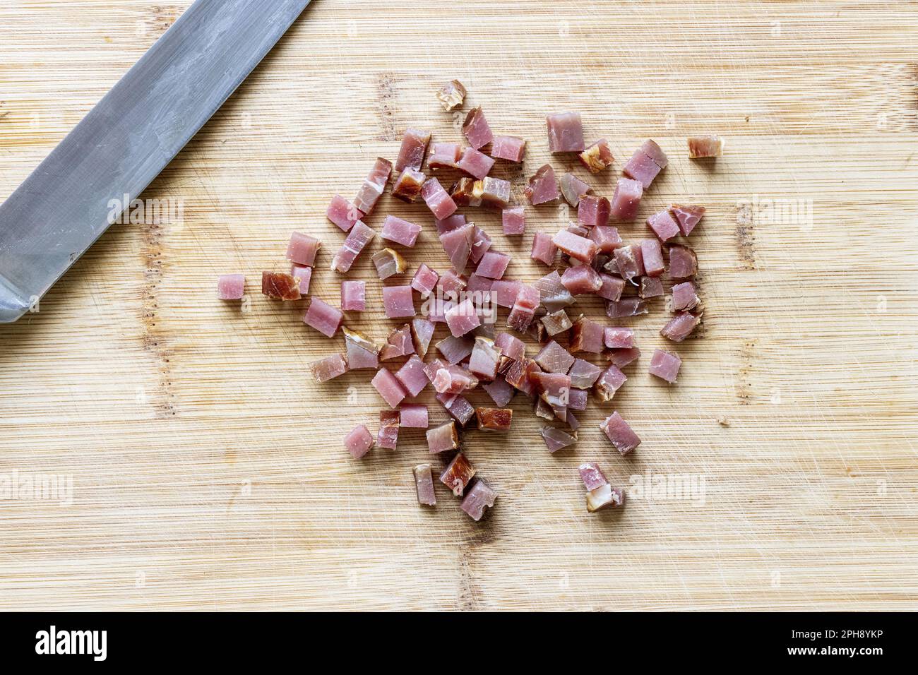 Smoked meat cut into cubes Stock Photo - Alamy