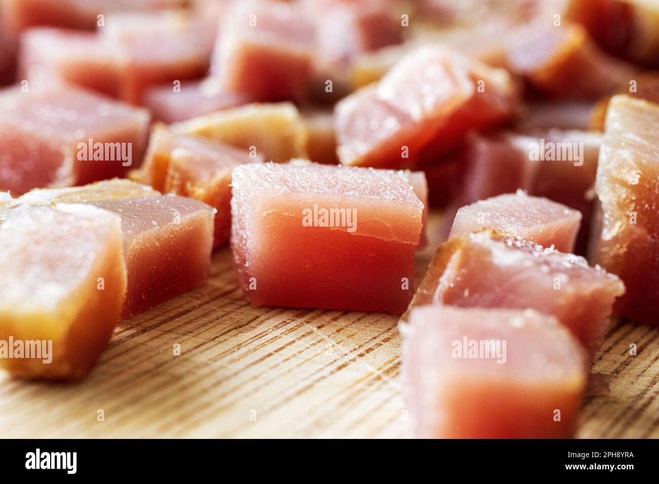 Smoked meat cut into cubes Stock Photo - Alamy