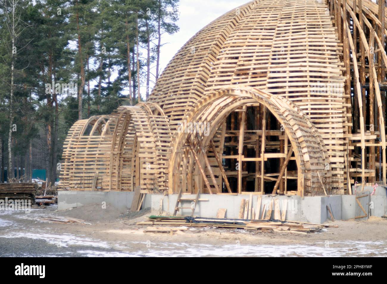 Wooden arched building in the form of a dome. Construction Stock Photo ...