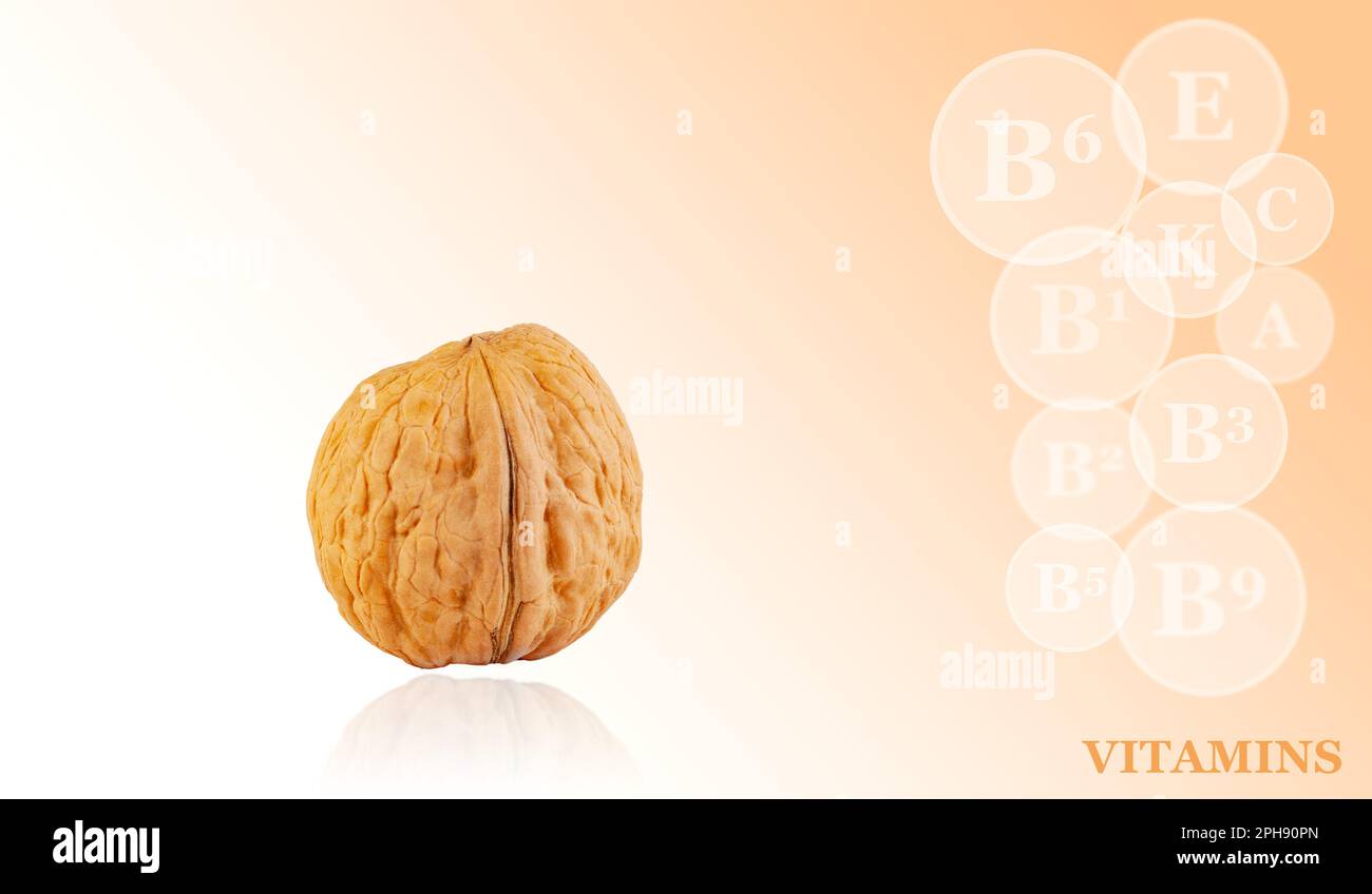 fresh kernels, broken and whole walnuts close-up isolated on color ...