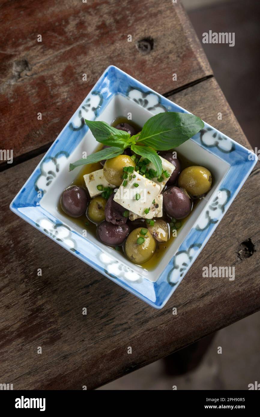 marinated spanish olives and feta cheese tapas in rustic barcelona ...