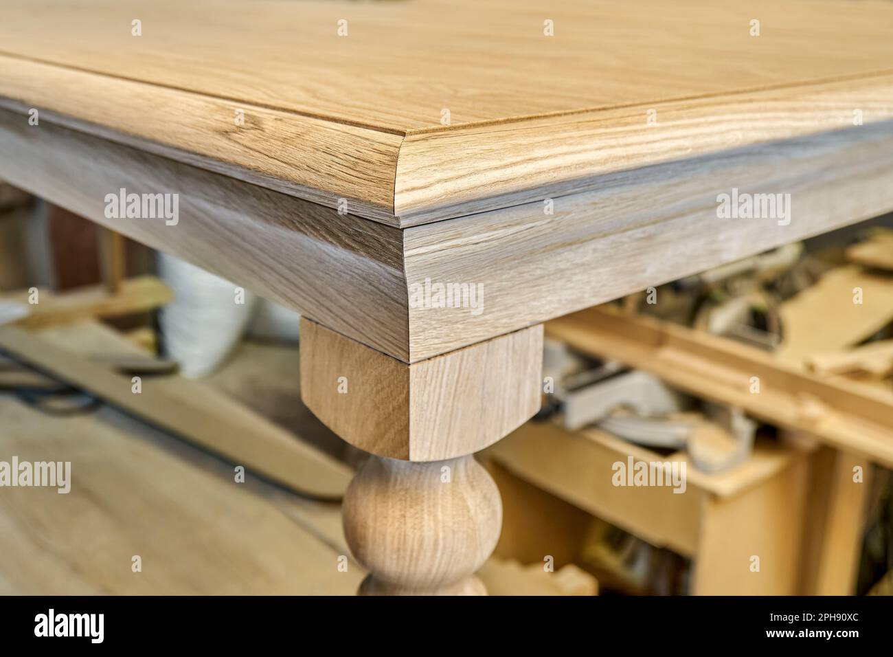 Wooden dining table with carved leg of solid oak and metal frame build ...