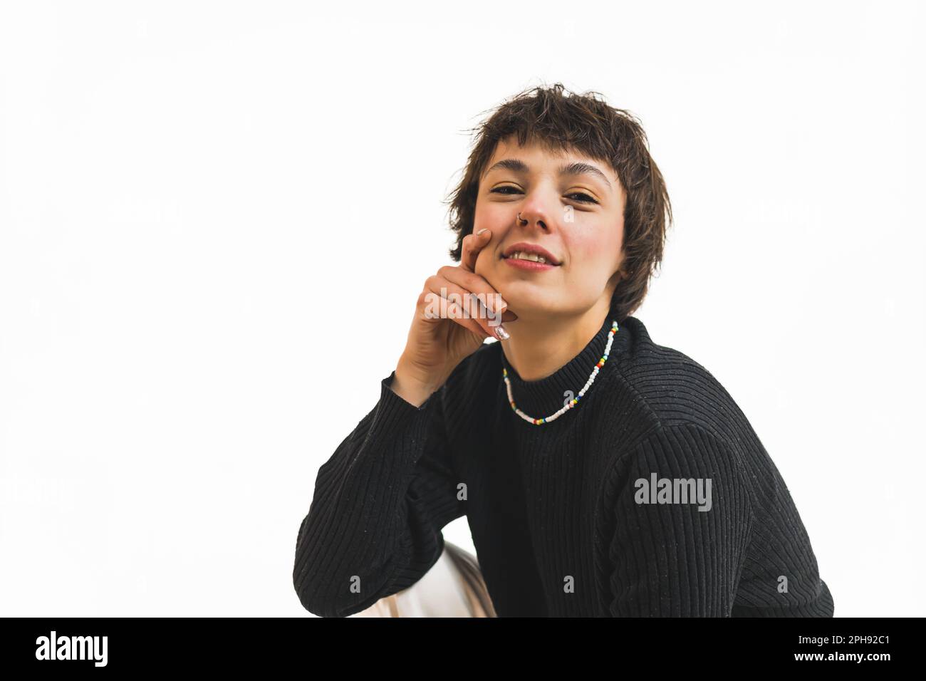 Girl with short dark haired hairs and bang smiling for photo model ...