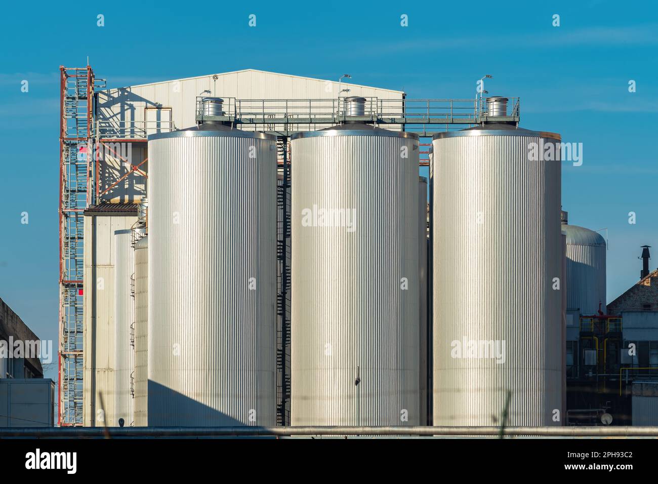 Brewery malt storage silo tanks and industrial building Stock Photo - Alamy