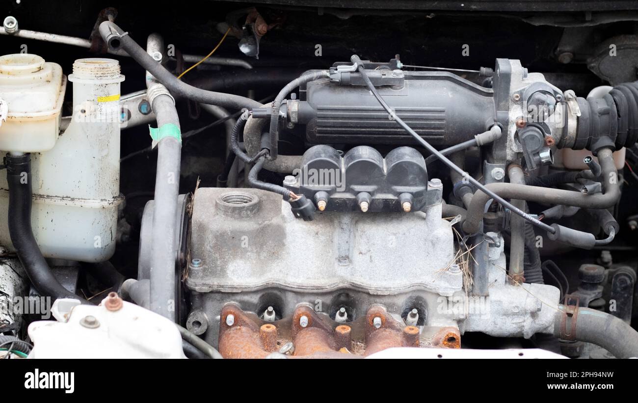 Broken crumpled car after a severe accident with a skewed body, after a ...