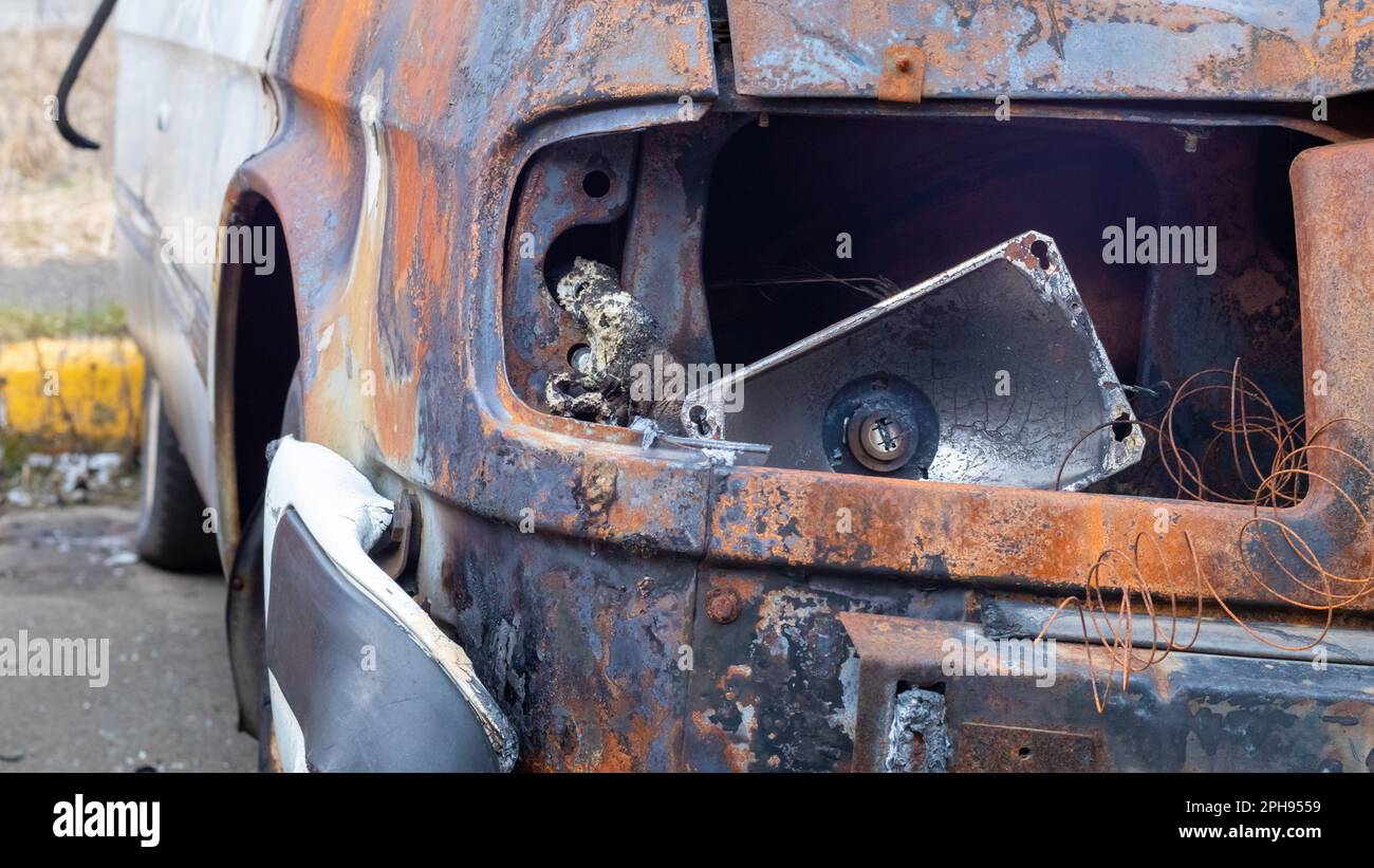 Burnt car body. Arson, short circuit. The skeleton of a burnt car ...