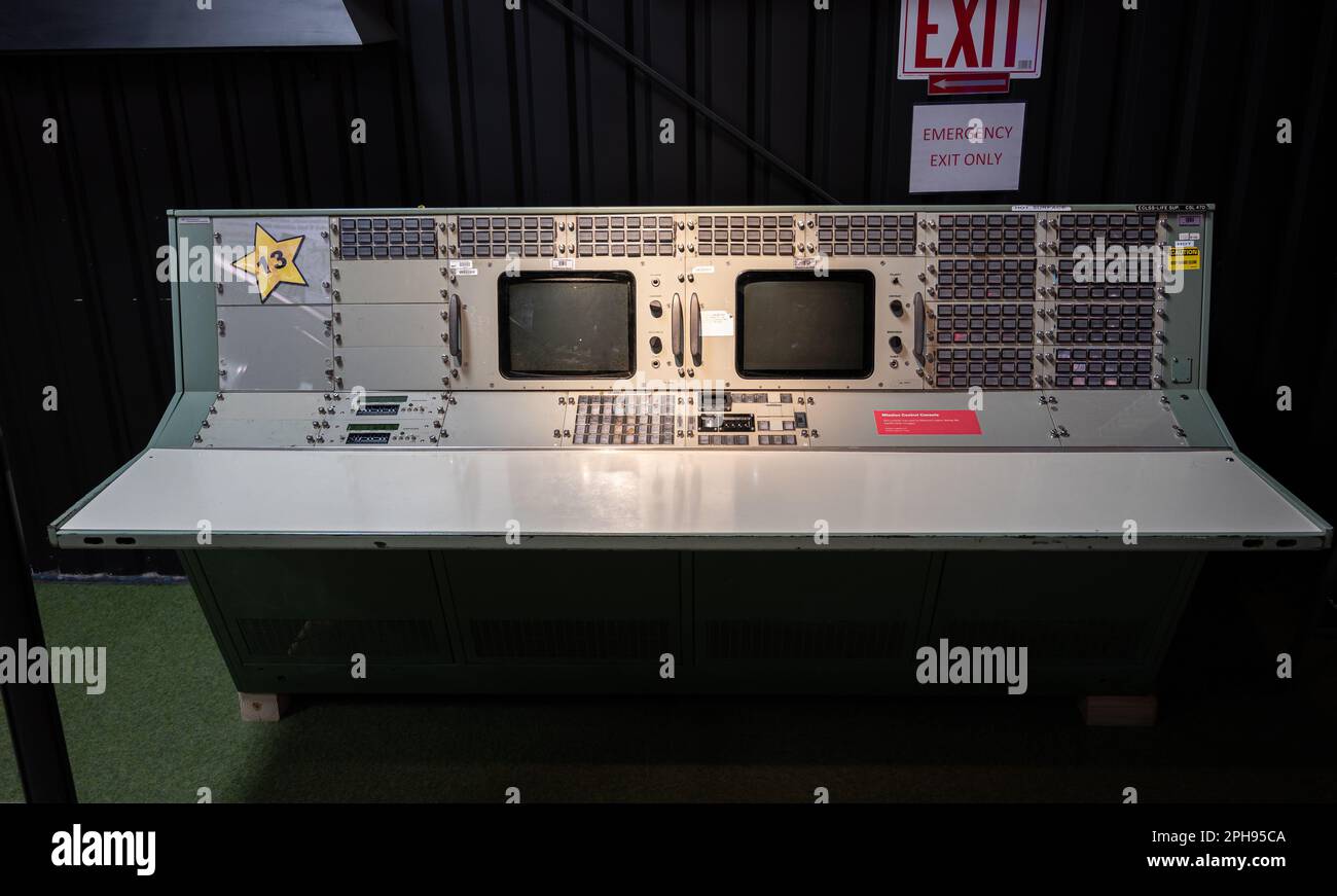 An aged mission control console featuring various switches and dials ...
